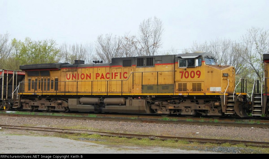 UP 7009